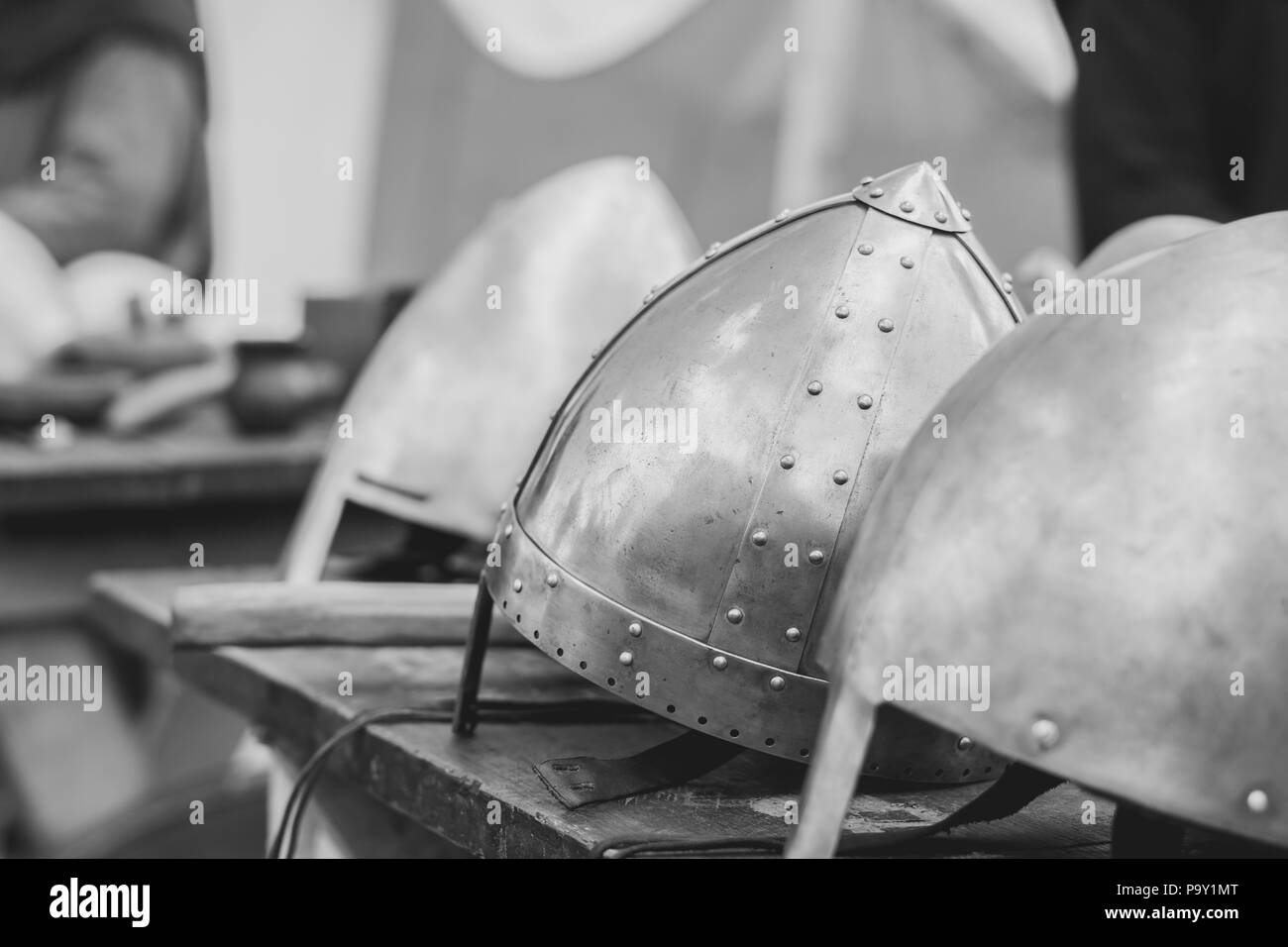 Medieval knights ' helmets with accessories are on the shelves Stock ...