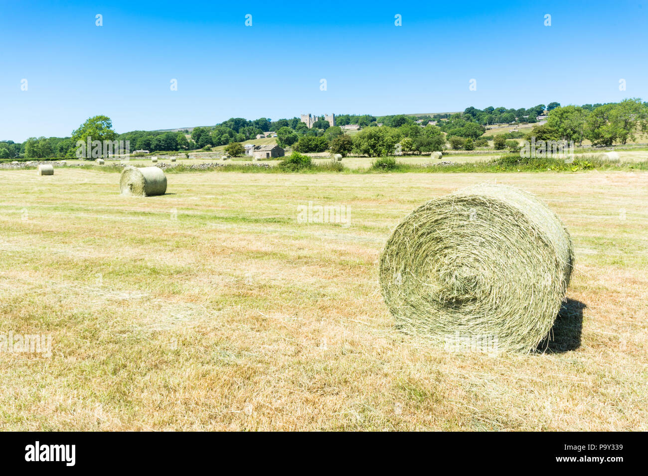 Hay bales and Bolton Castle Stock Photo - Alamy
