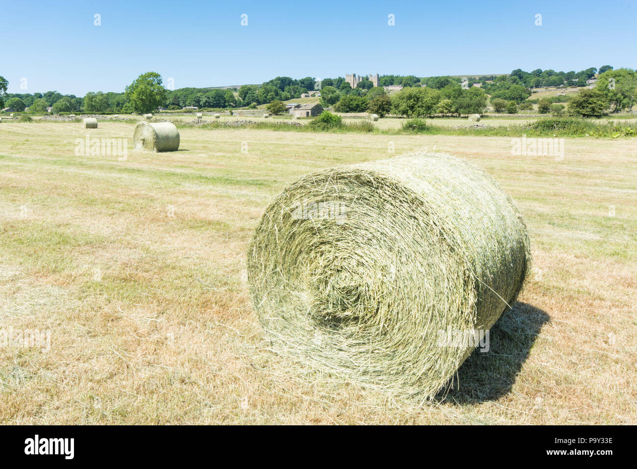 Hay bales and Bolton Castle Stock Photo - Alamy