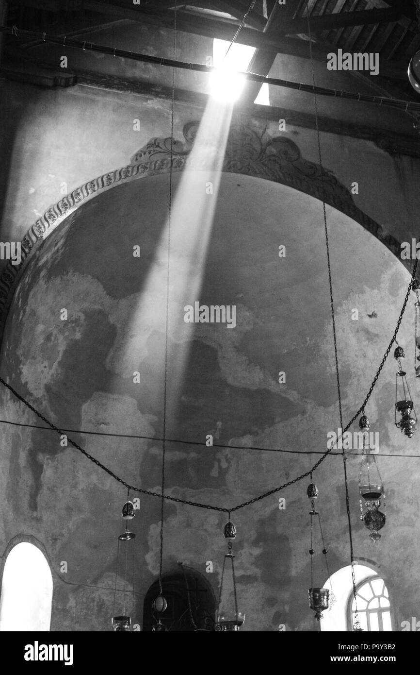 Dramatic beam of light is falling into the church of nativity in ...