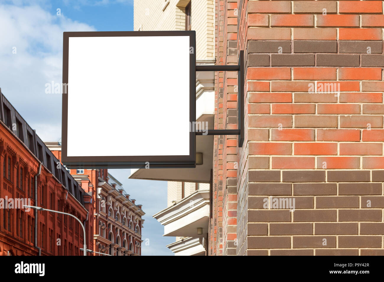 Blank square signboard on the brick wall. 3d illustration Stock Photo ...