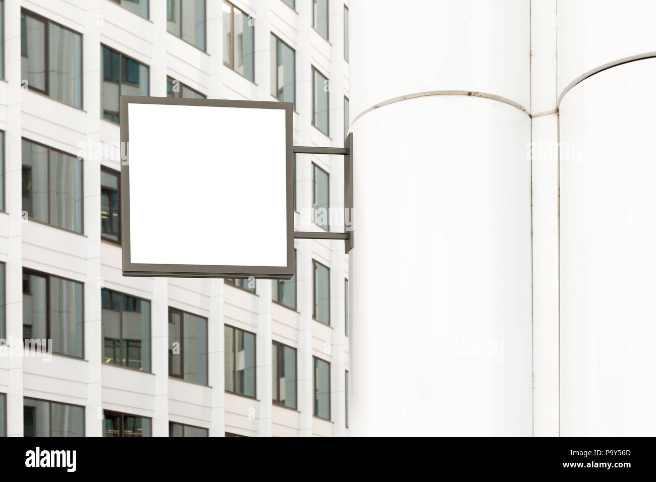 Blank square signboard on the white wall. 3d illustration Stock Photo ...