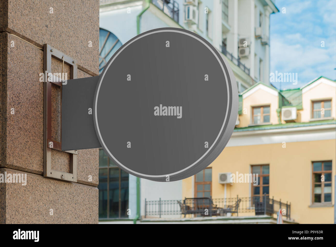 Blank gray round signboard on the granite wall Stock Photo - Alamy