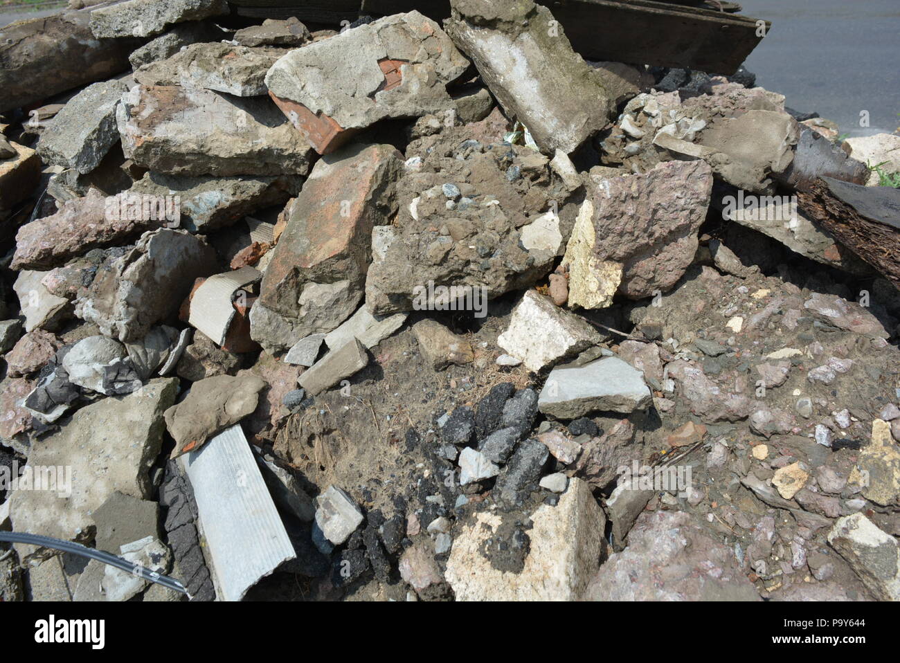 Building debris after construction work, pile of different rubbish ...