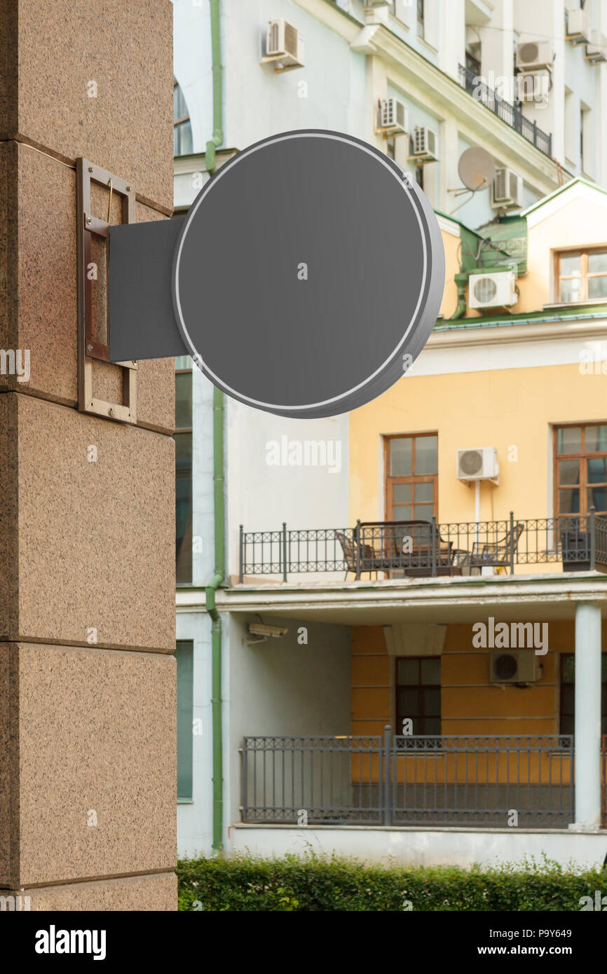 Blank gray round signboard on the granite wall Stock Photo - Alamy