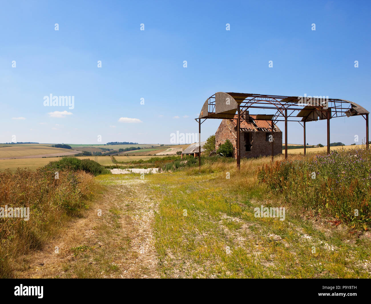 a derelict farm on a hill in Burdale in the Yorkshire Wolds with ...