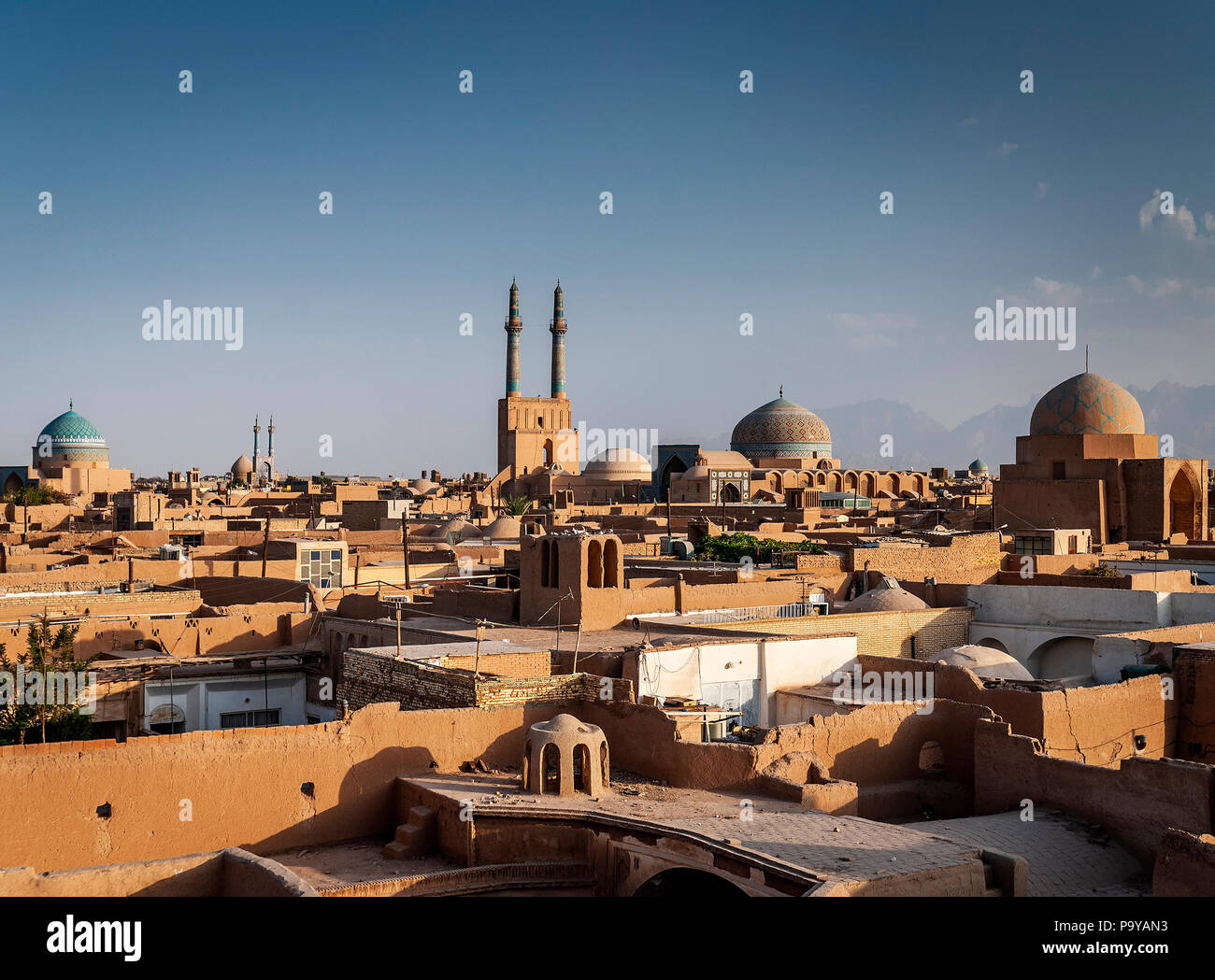 rooftops downtown mosque and landscape view of yazd city old town in ...