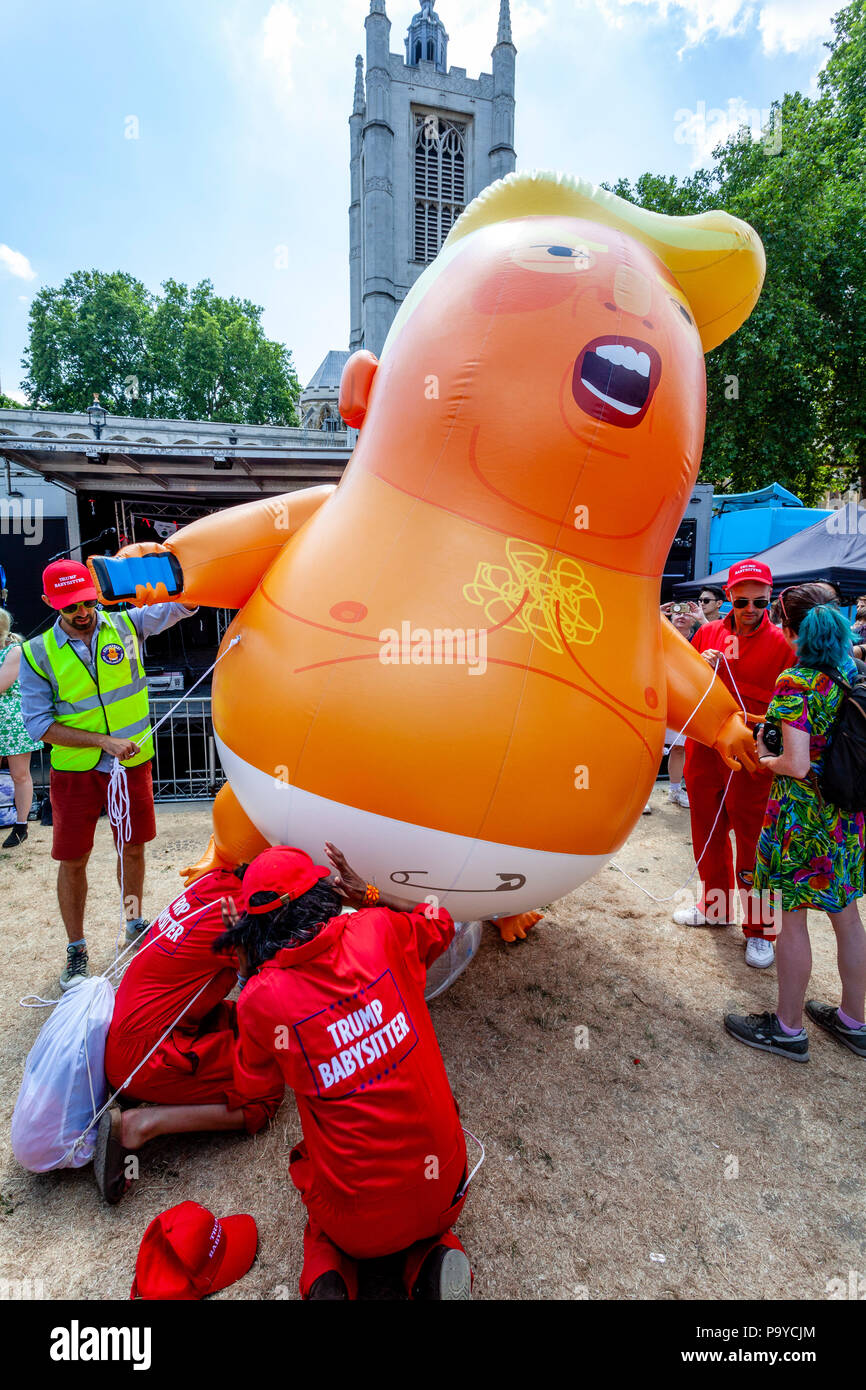A Group Of Anti Trump Protestors With An ‘Angry Baby’ Inflatable Blimp ...
