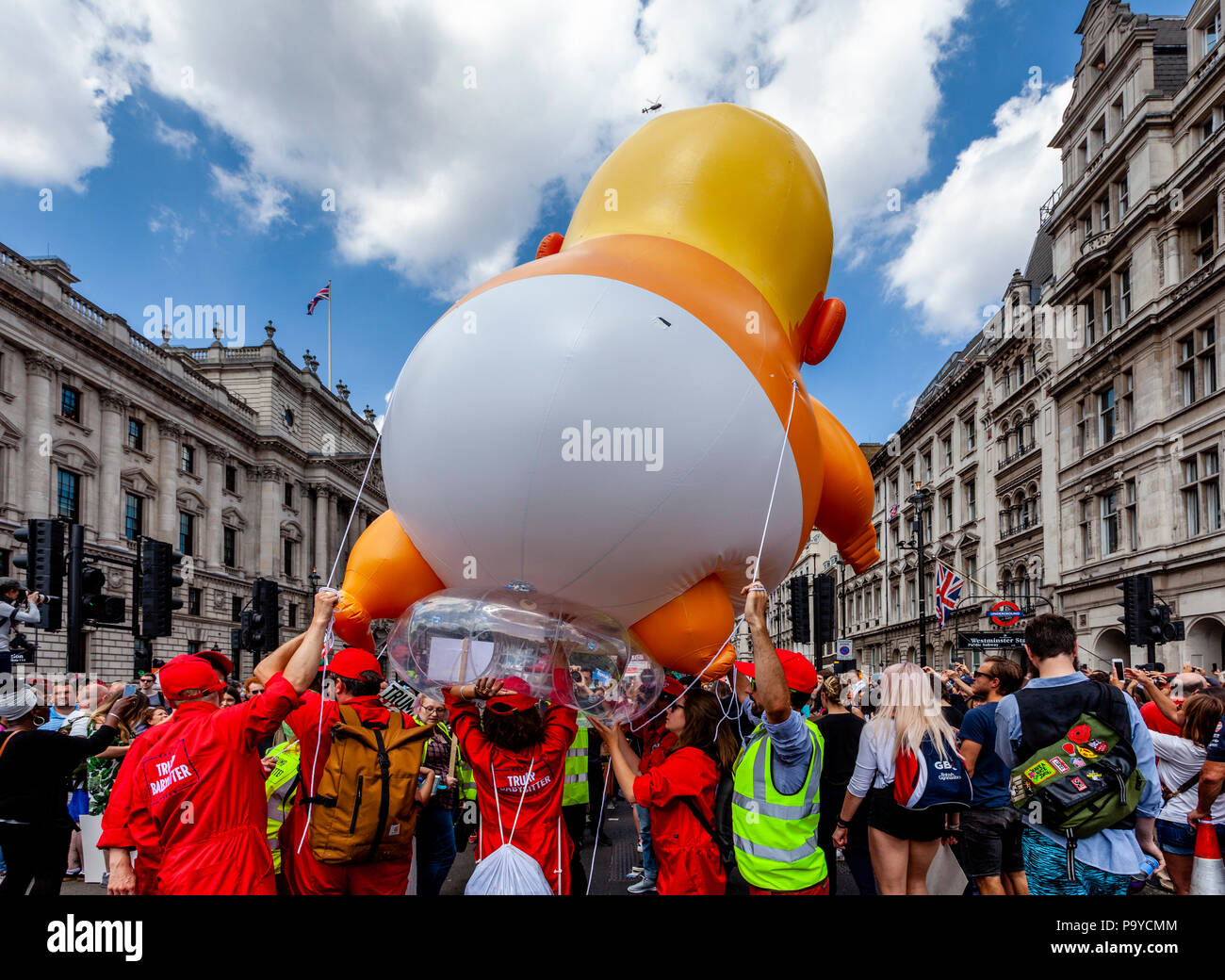Anti Trump Protestors Carry An ‘Angry Baby’ Inflatable Blimp Mocking ...