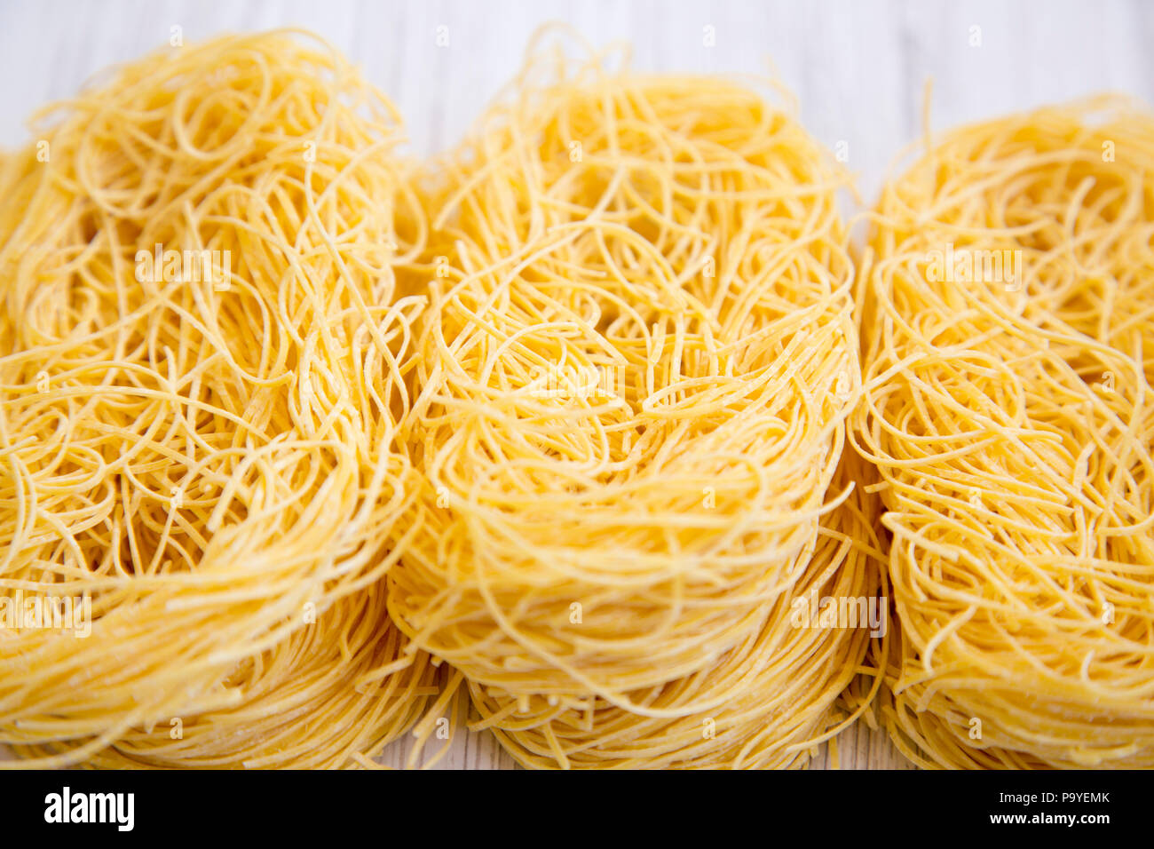 Tagliolini pasta raw uncooked hi-res stock photography and images - Alamy