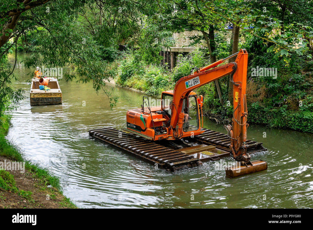 Large floating crane dredging river taken in Frome, Somerset, UK on 19 ...