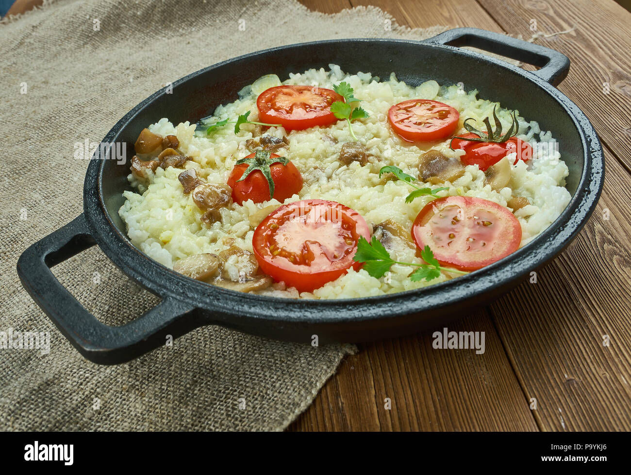 Risotto Pizza, Italians cook rice for kids of all ages Stock Photo - Alamy