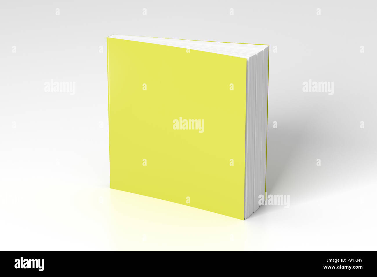 Blank yellow square soft cover book standing on white background ...