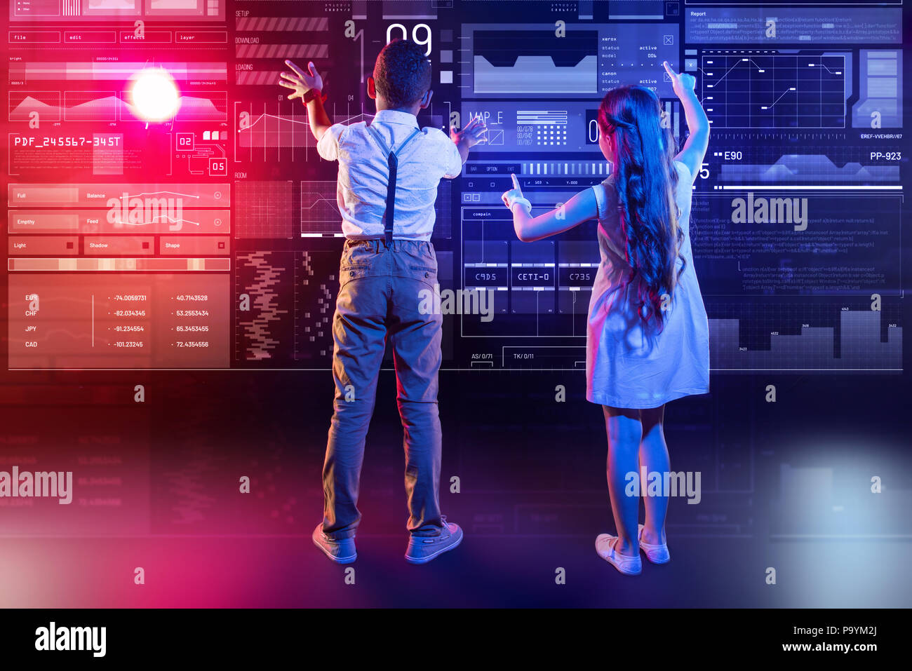 Two friends touching the screen while being at home Stock Photo - Alamy