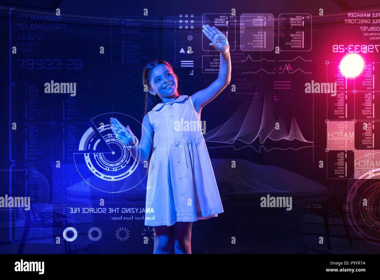 Lovely girl putting two hands on the screen and smiling Stock Photo - Alamy