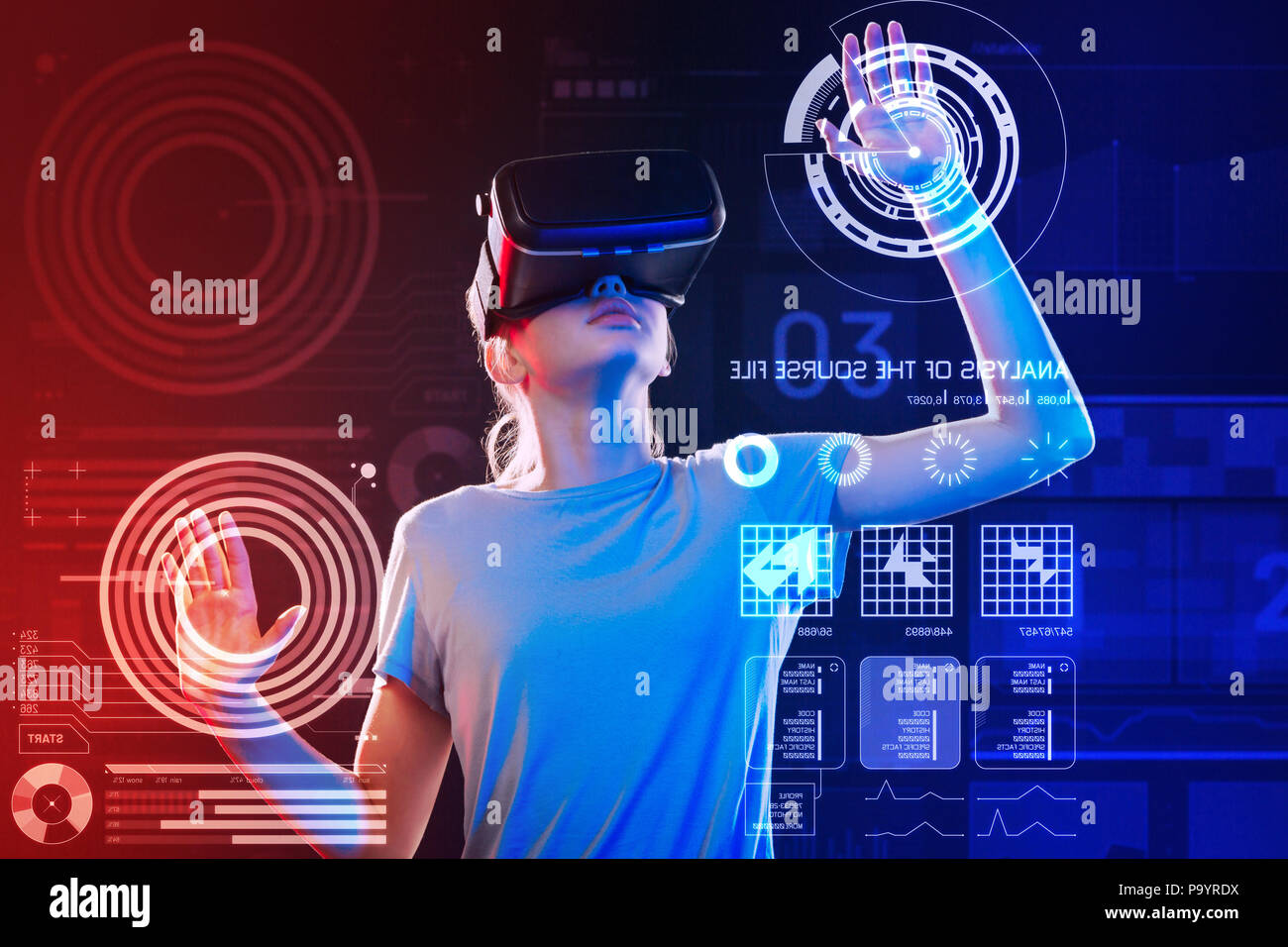 Young person using alternative reality while studying Stock Photo - Alamy