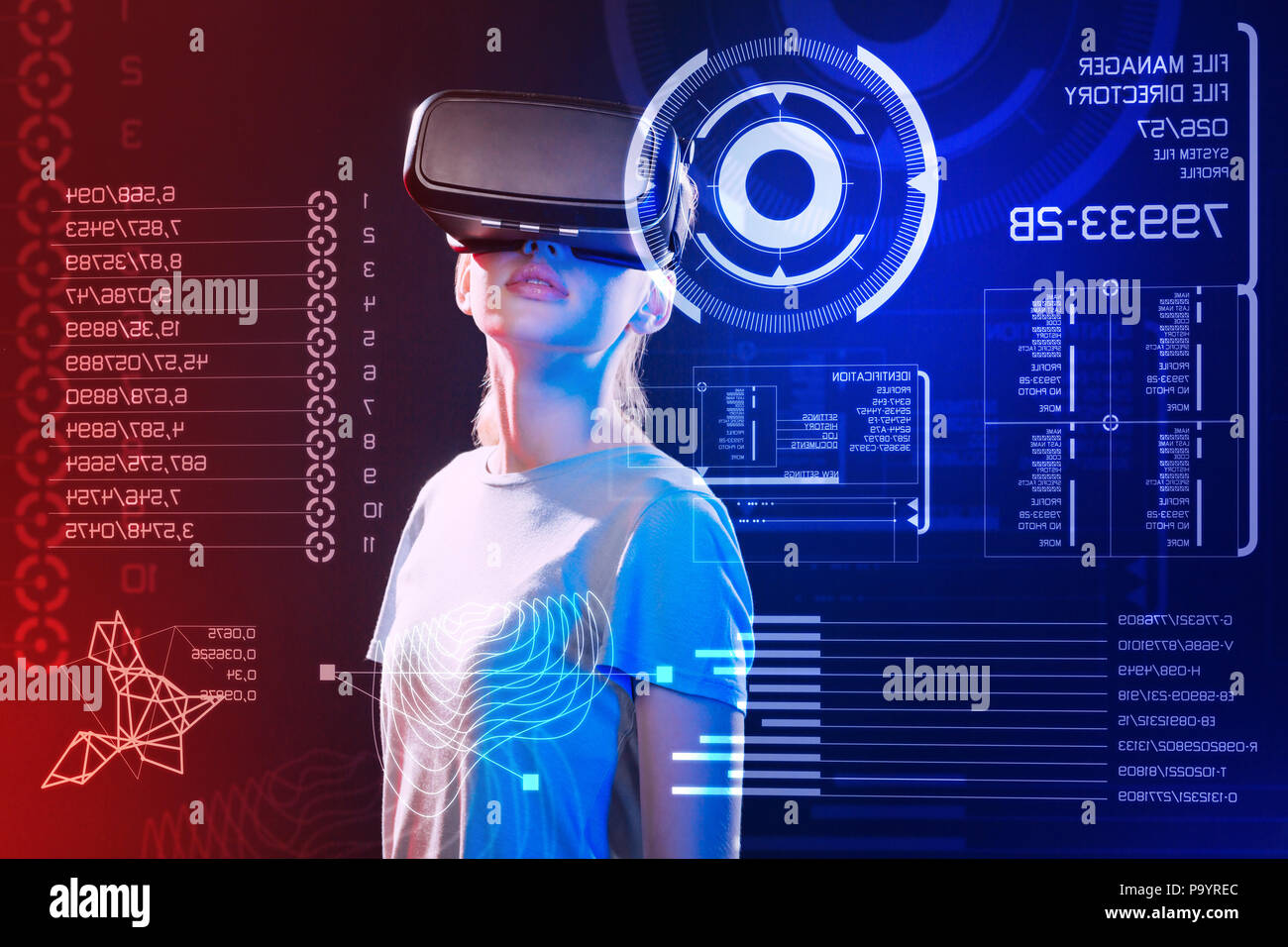 Calm girl standing still while wearing virtual reality glasses Stock ... Calm girl standing still while wearing virtual reality glasses Stock ...
