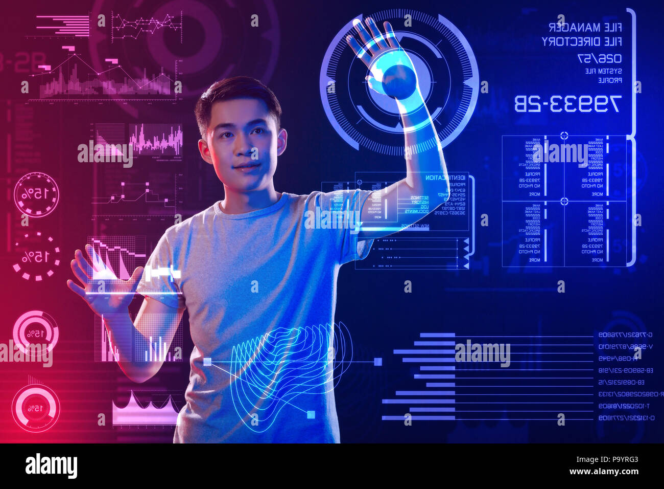 Qualified software developer putting his hands on the screen Stock ...