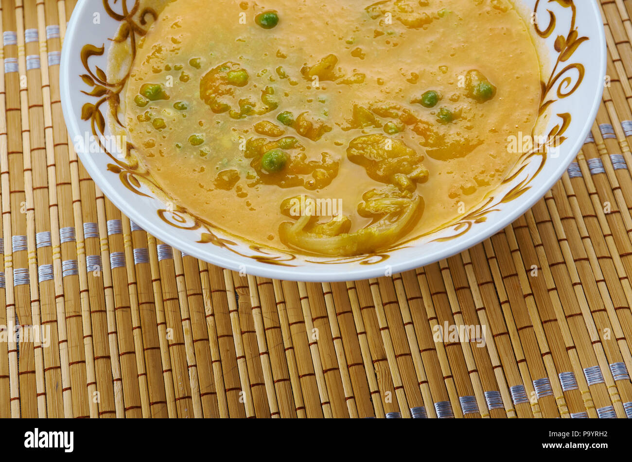 Nimona curry - Potatoes , Green pea curry Stock Photo - Alamy