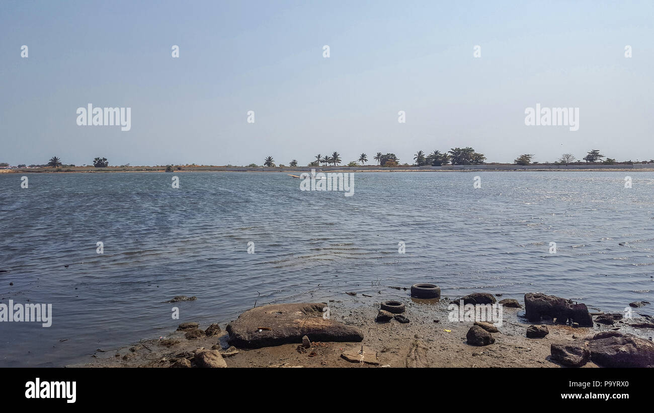 View of the bay of the new marginal in Luanda, with birds, fisherman ...