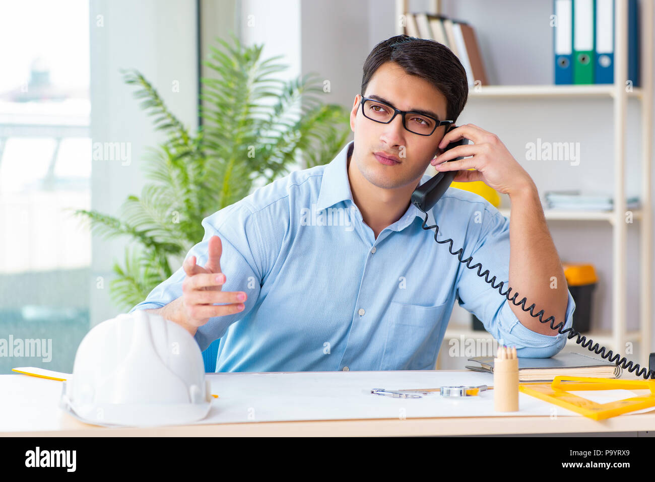 Construction engineer working on new project Stock Photo - Alamy