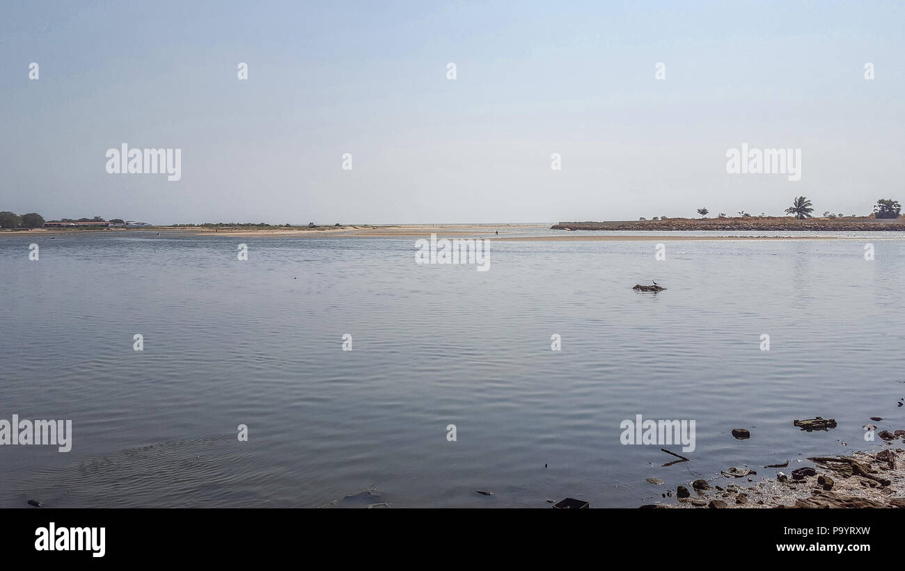 View of the bay of the new marginal in Luanda, with birds, island and ...