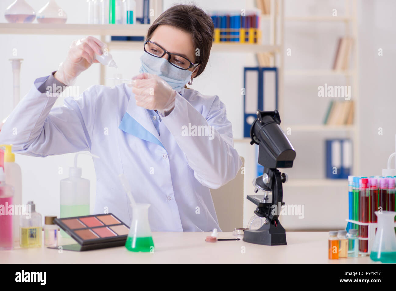 Lab chemist checking beauty and make-up products Stock Photo - Alamy