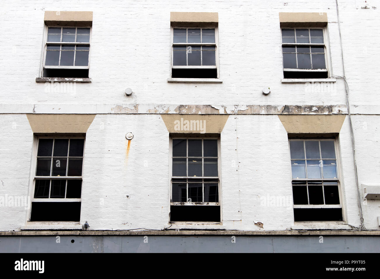 open windows for ventilation on dilapidated vacant premises due for ...