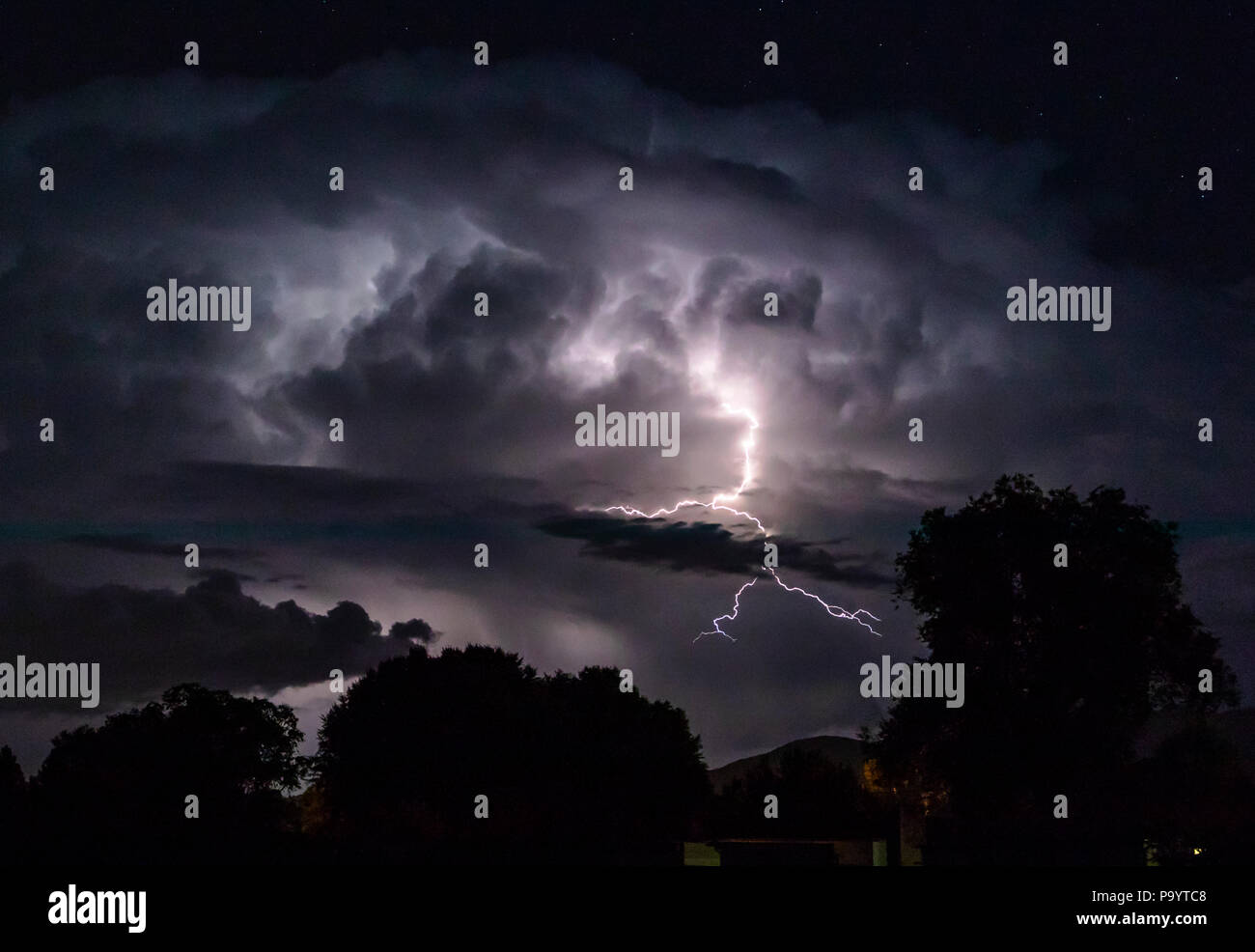 Dramatic lightning storm illuminates nighttime sky; Salida; Colorado ...