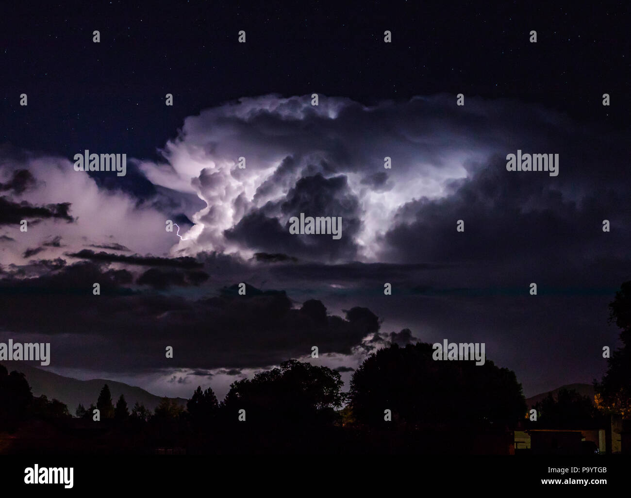 Dramatic lightning storm illuminates nighttime sky; Salida; Colorado ...