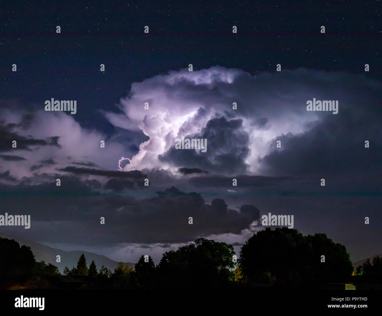 Dramatic lightning storm illuminates nighttime sky; Salida; Colorado ...
