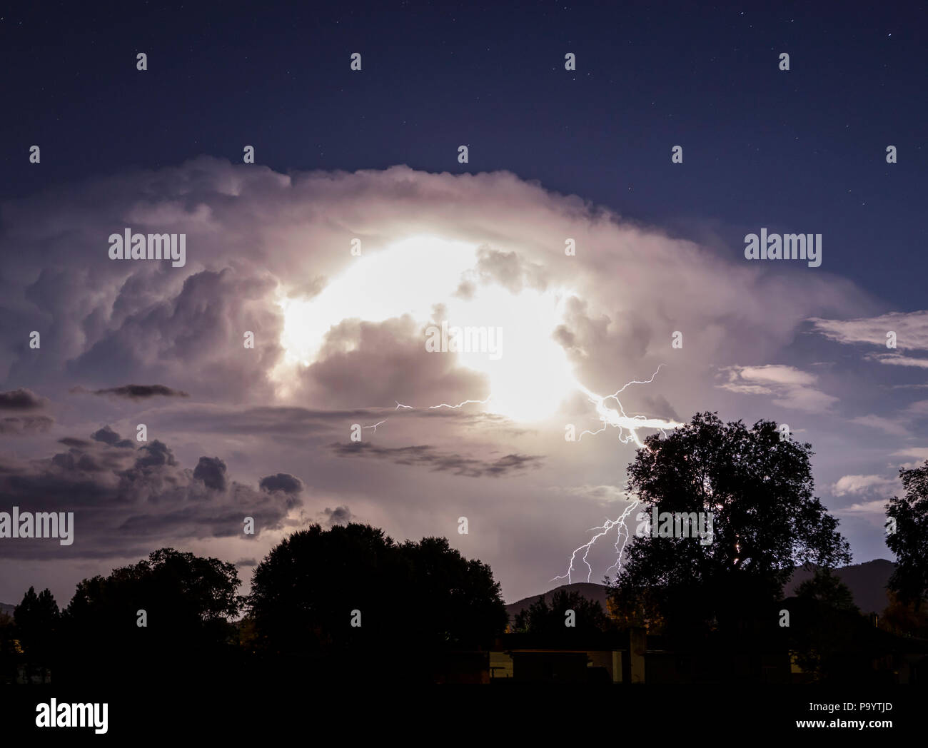 Dramatic lightning storm illuminates nighttime sky; Salida; Colorado ...
