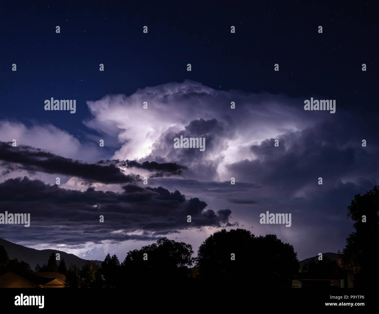 Dramatic lightning storm illuminates nighttime sky; Salida; Colorado ...