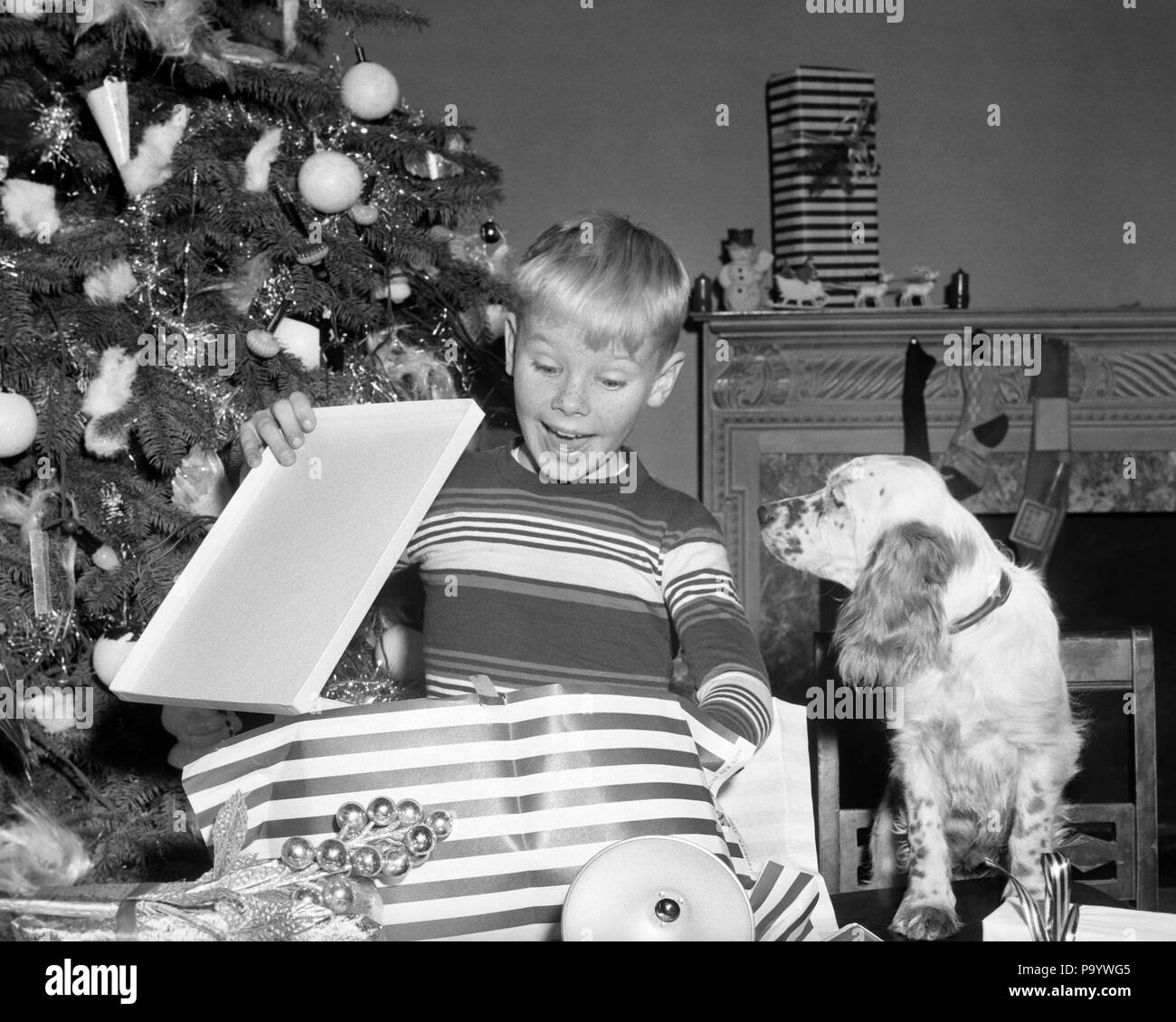 Xmas holiday present child Black and White Stock Photos & Images - Alamy