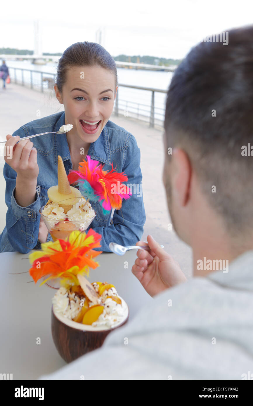 Husband and wife eating an ice cream hi-res stock photography and ...