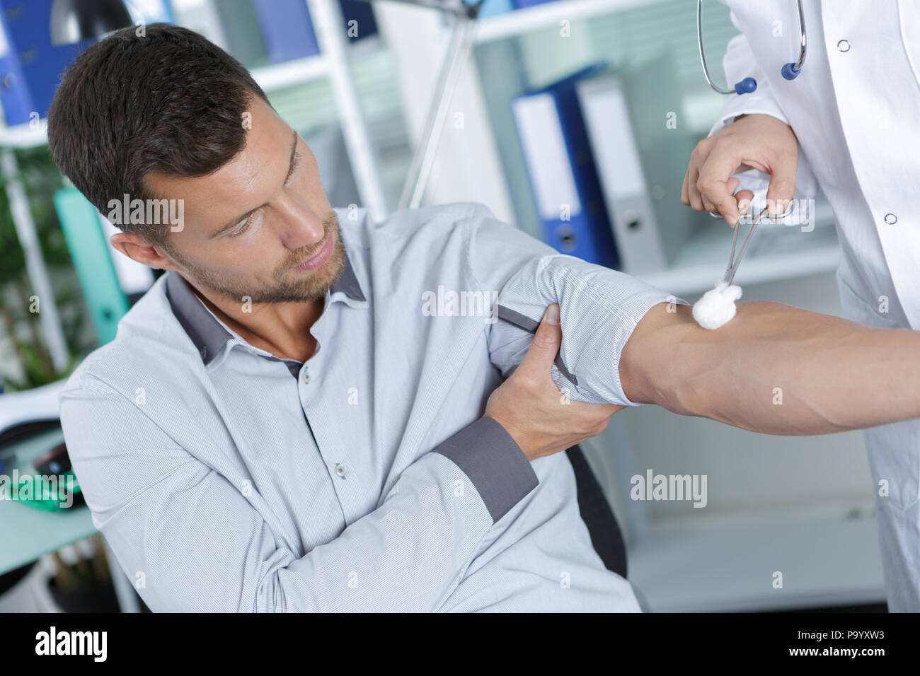 patient after the procedure of taking blood Stock Photo - Alamy