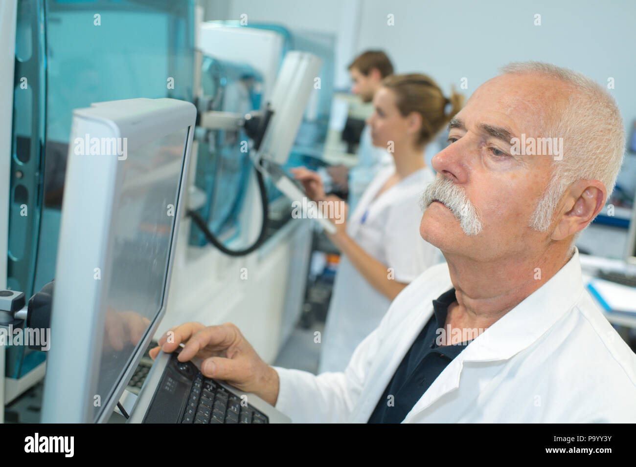 technician of the laboratory equipment Stock Photo - Alamy