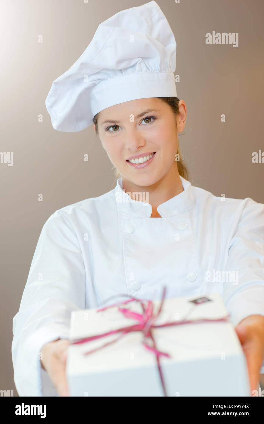 Holding box of cakes hi-res stock photography and images - Alamy