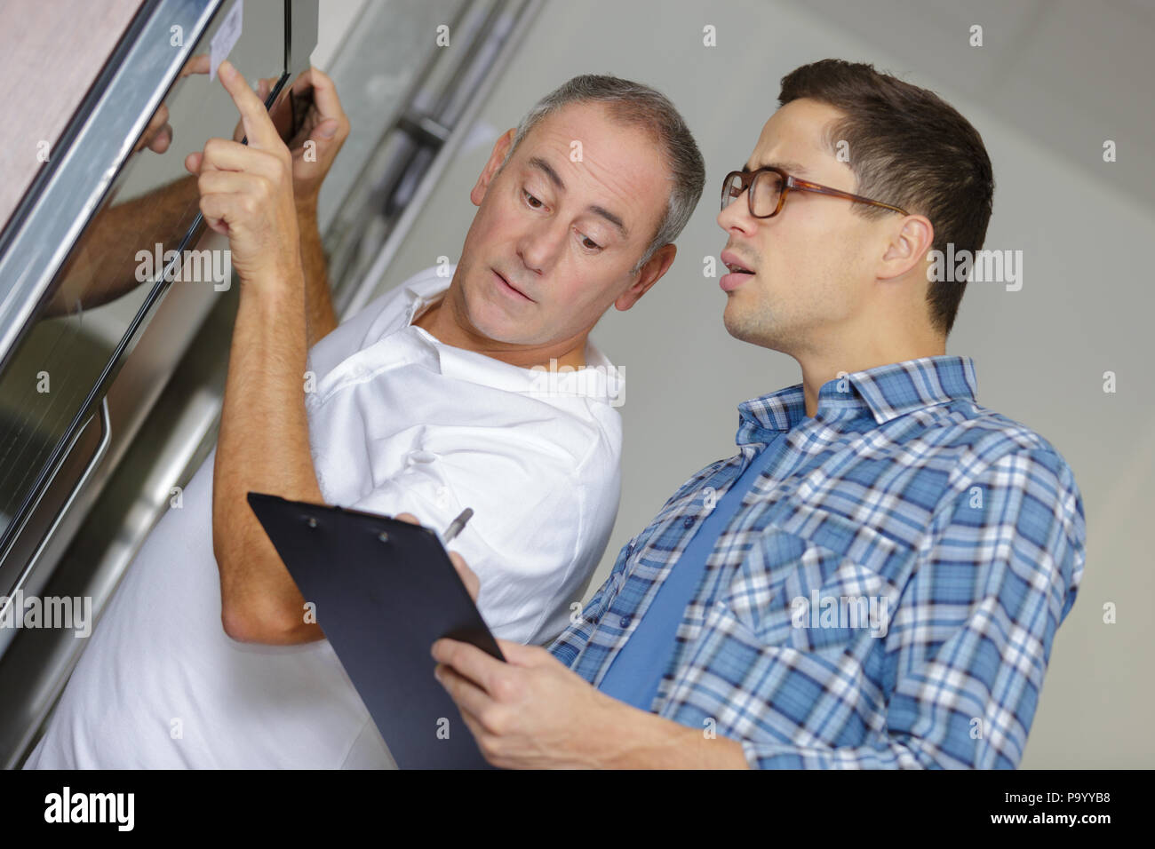 the glass fixture inspector Stock Photo - Alamy