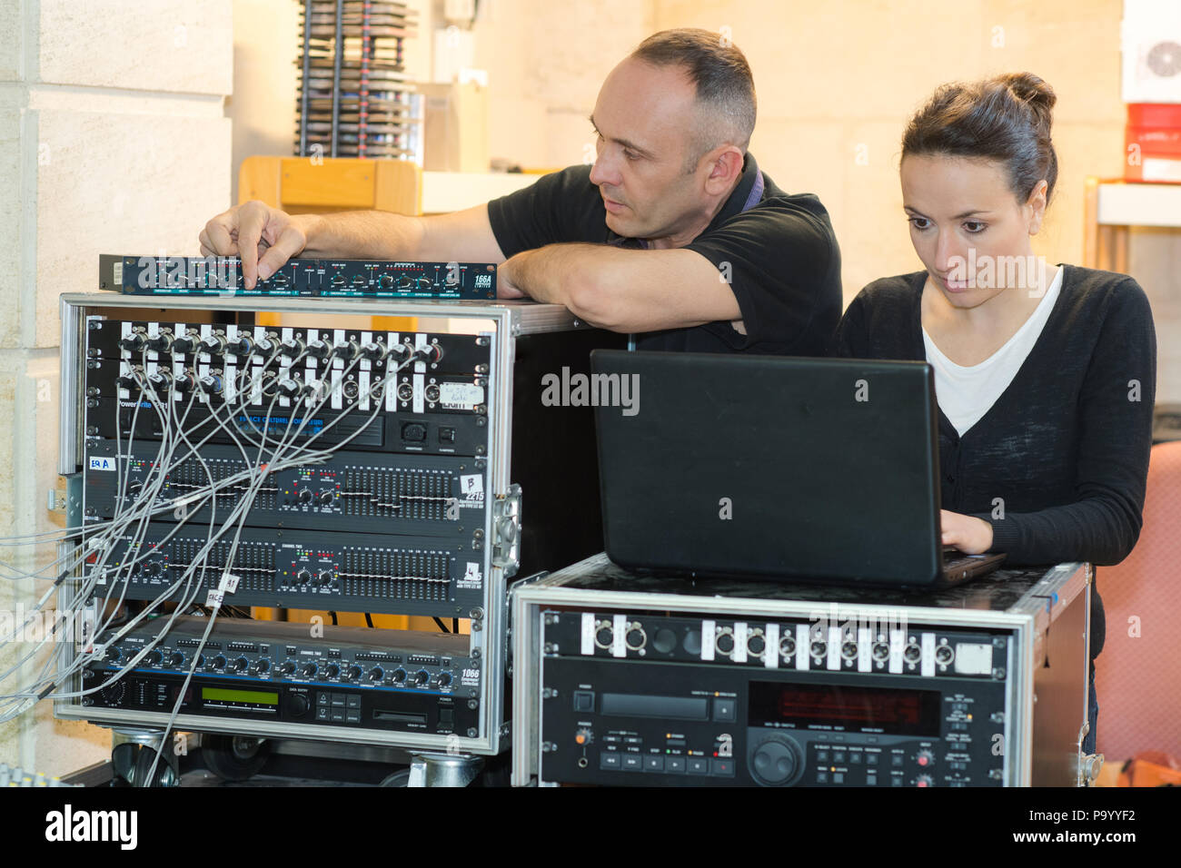 Setting up sound equipment hi-res stock photography and images - Alamy