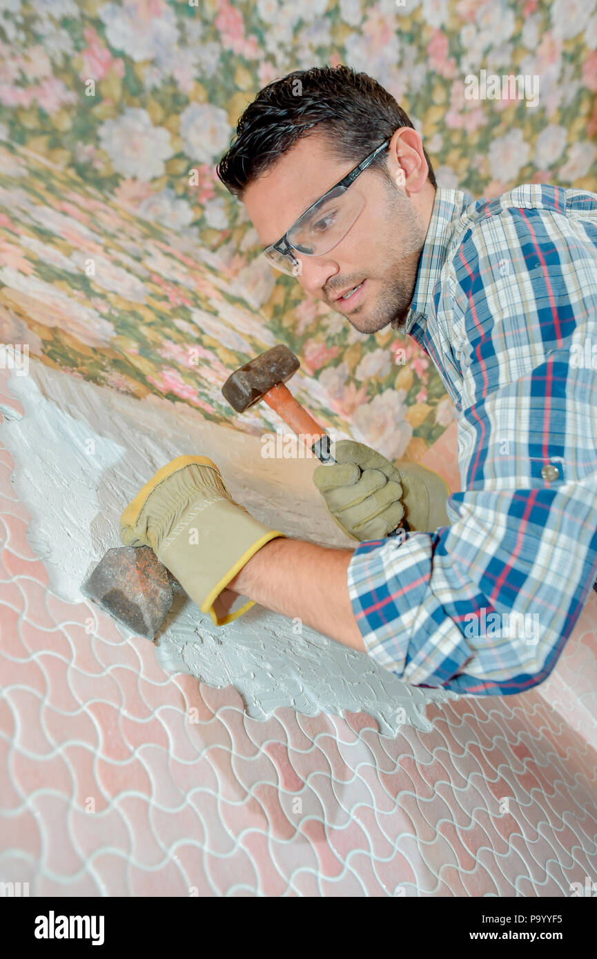 using a razor scraper Stock Photo - Alamy