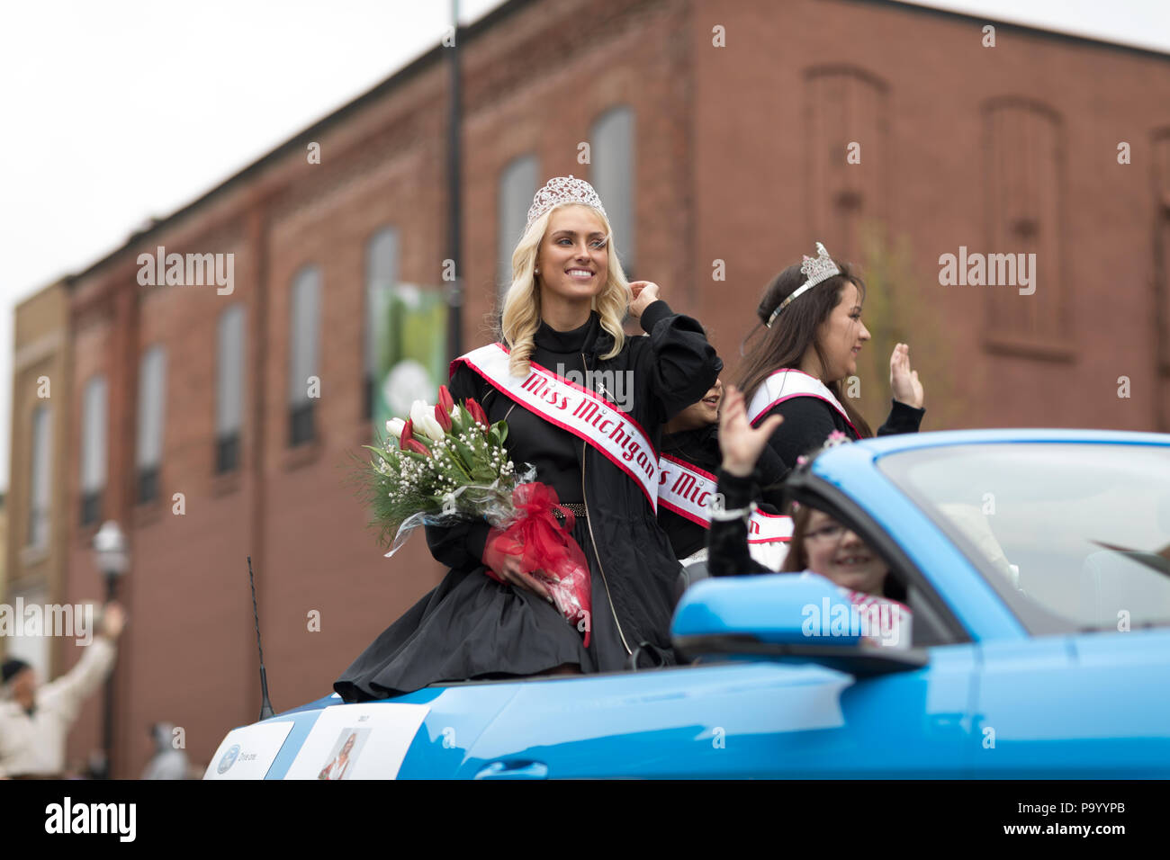 Holland, Michigan, USA - May 12, 2018 Beauty queen riding on a ford ...