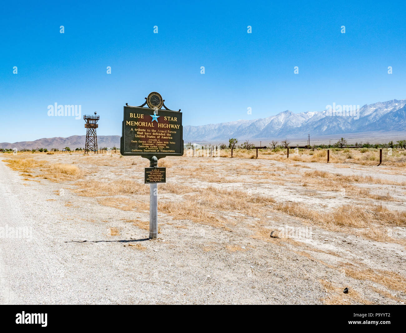 Blue Star Memorial Highway sign outside Manzanar Detention Camp with ...