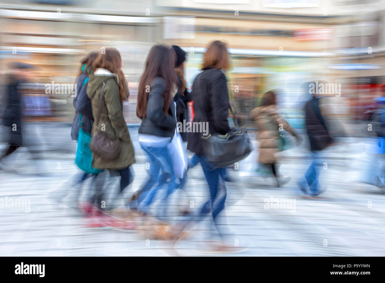 Large group of busy people in motion blur Stock Photo - Alamy