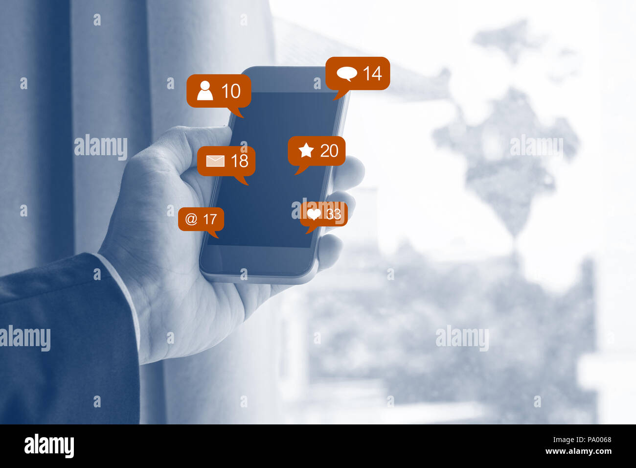 Businessman hand holding mobile smart phone, with social media and ...