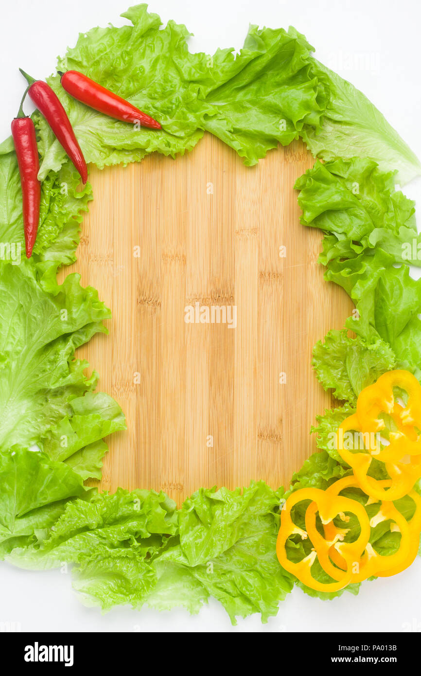 Copy space on a wooden or bamboo background, covered with vegeta Stock ...