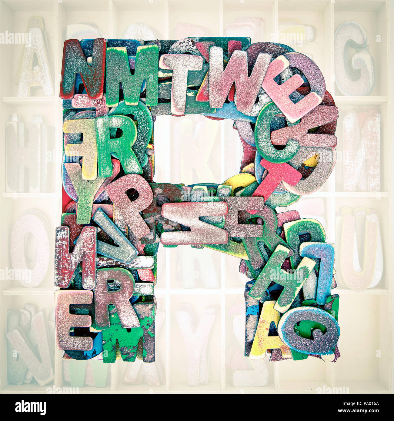 lots of small wooden letters to make up the letter R Stock Photo - Alamy