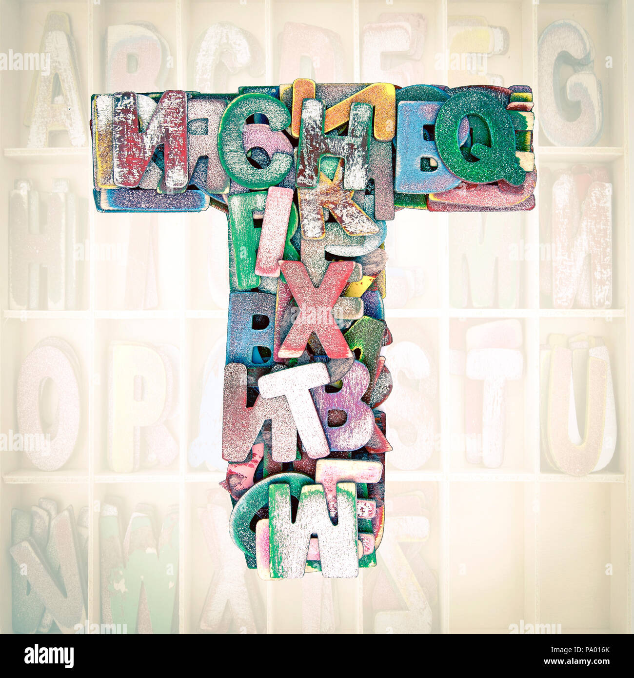 lots of small wooden letters to make up the letter T Stock Photo - Alamy