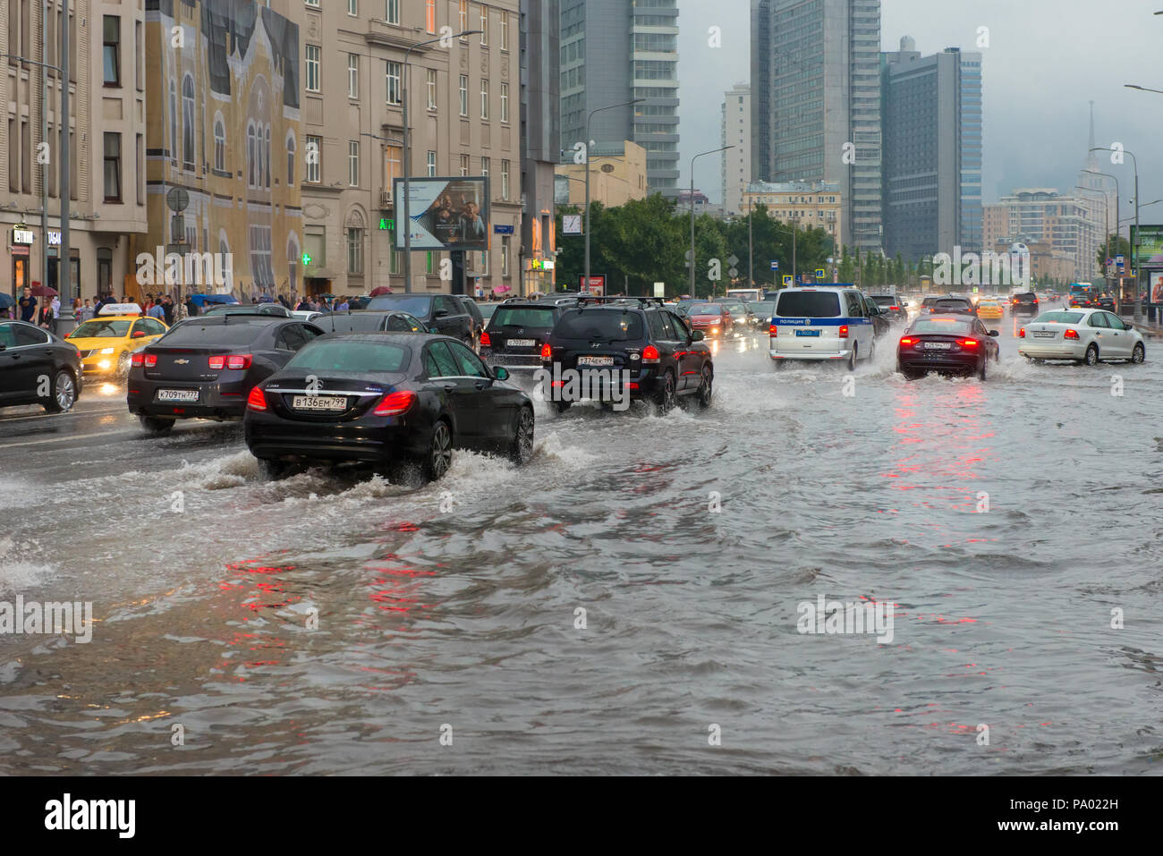 MOSCOW, RUSSIA - JULY 19, 2018: Heavy rain flooded the Moscow street ...