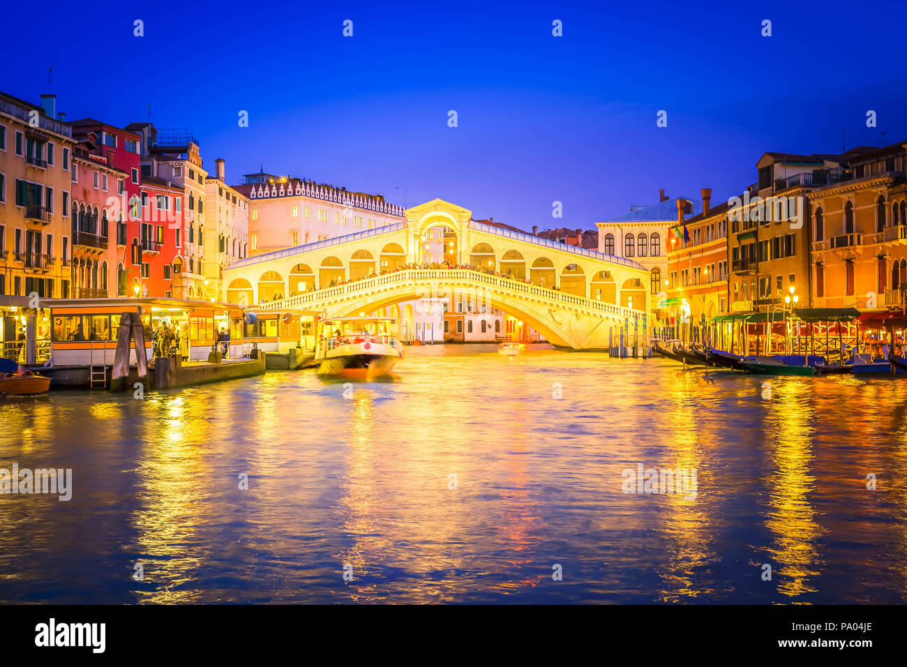view of famouse Rialto bridge at night, Venice, Italy, toned Stock ...